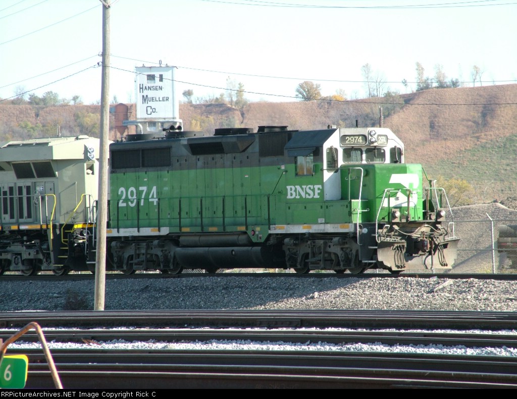 BNSF 2974 Has 2 KCS units in tow with Grain Hoppers